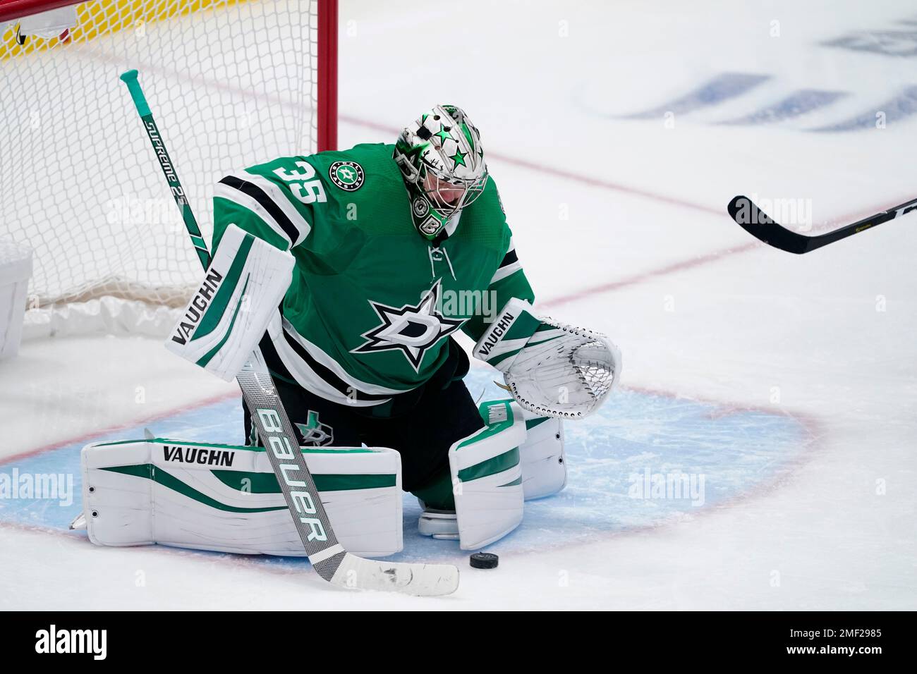 Dallas Stars goaltender Anton Khudobin attempts to block a shot from ...