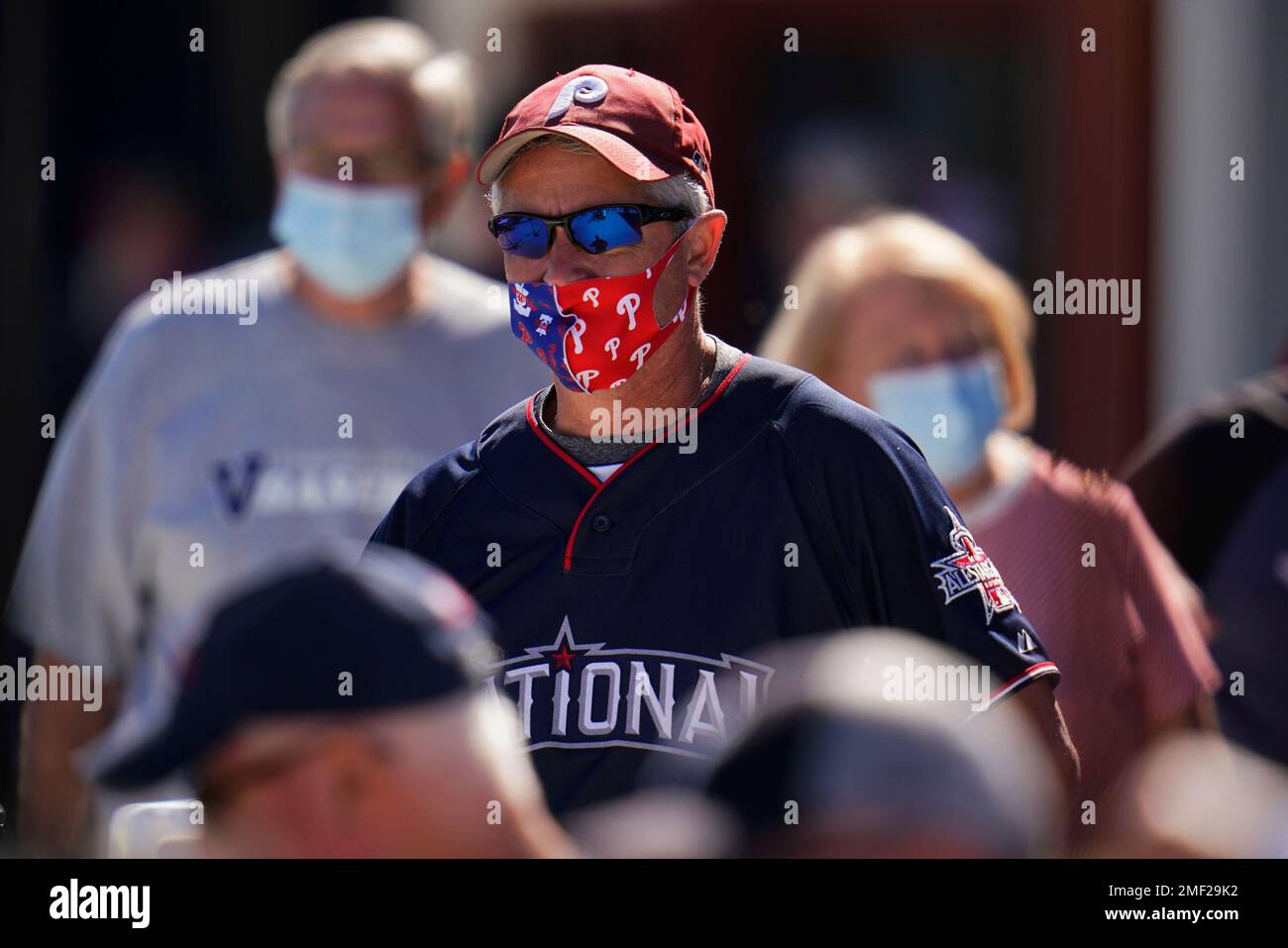 A Philadelphia Phillies fan walks on the main concourse at BayCare ...