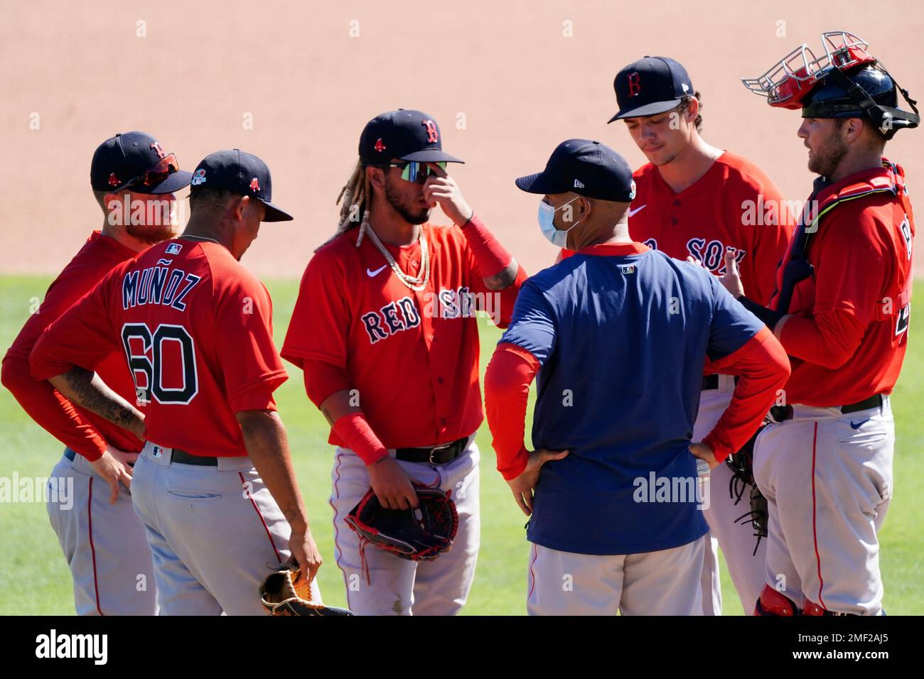 Boston Red Sox managers Alex Cora speaks to his players during a ...