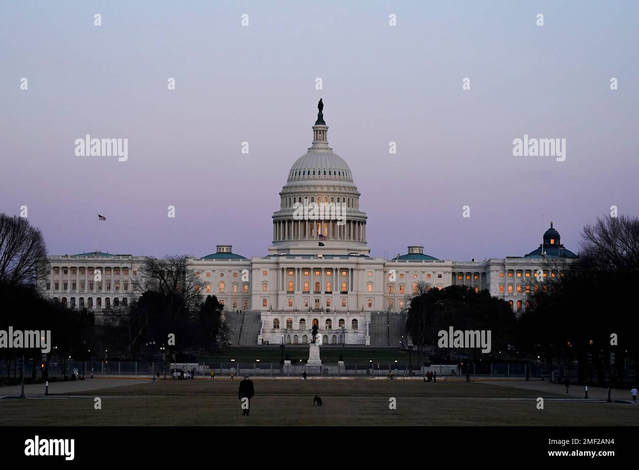 The U.S. Capitol building is shown after sunset Thursday, March 4, 2021 ...