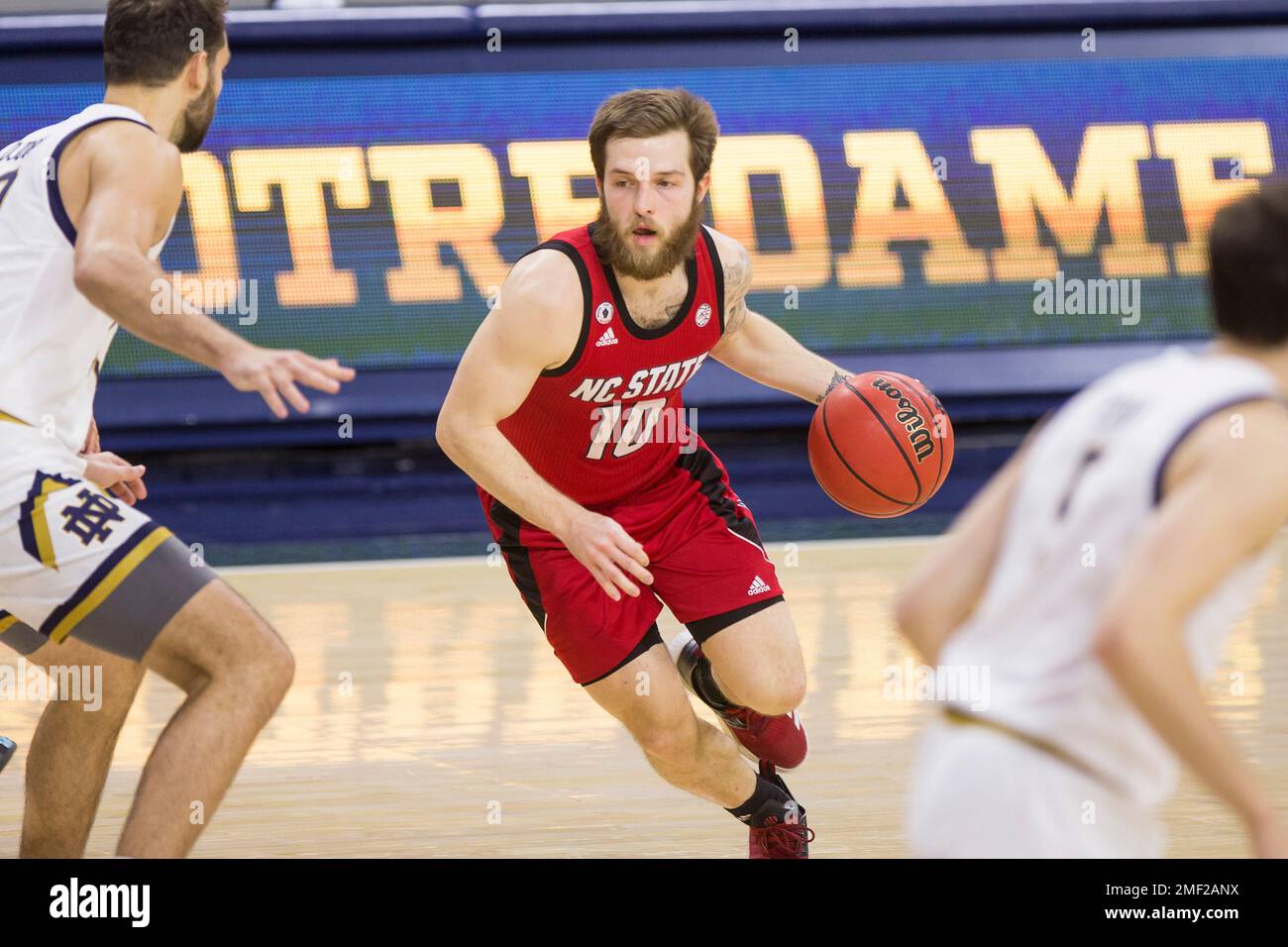 North Carolina State's Braxton Beverly (10) drives in on Notre Dame's ...