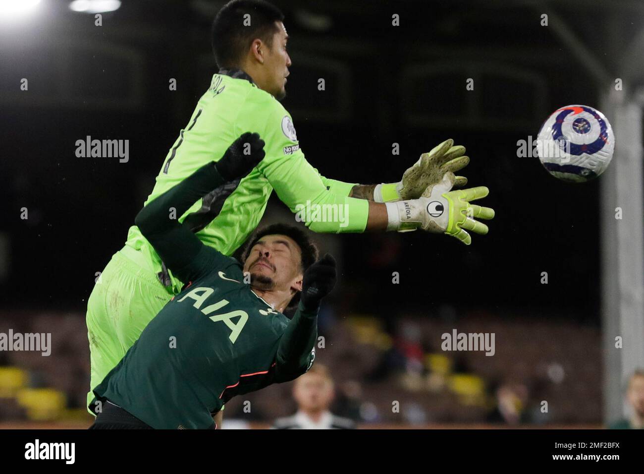 Fulham's goalkeeper Alphonse Areola blocks Tottenham's Dele Alli's ...