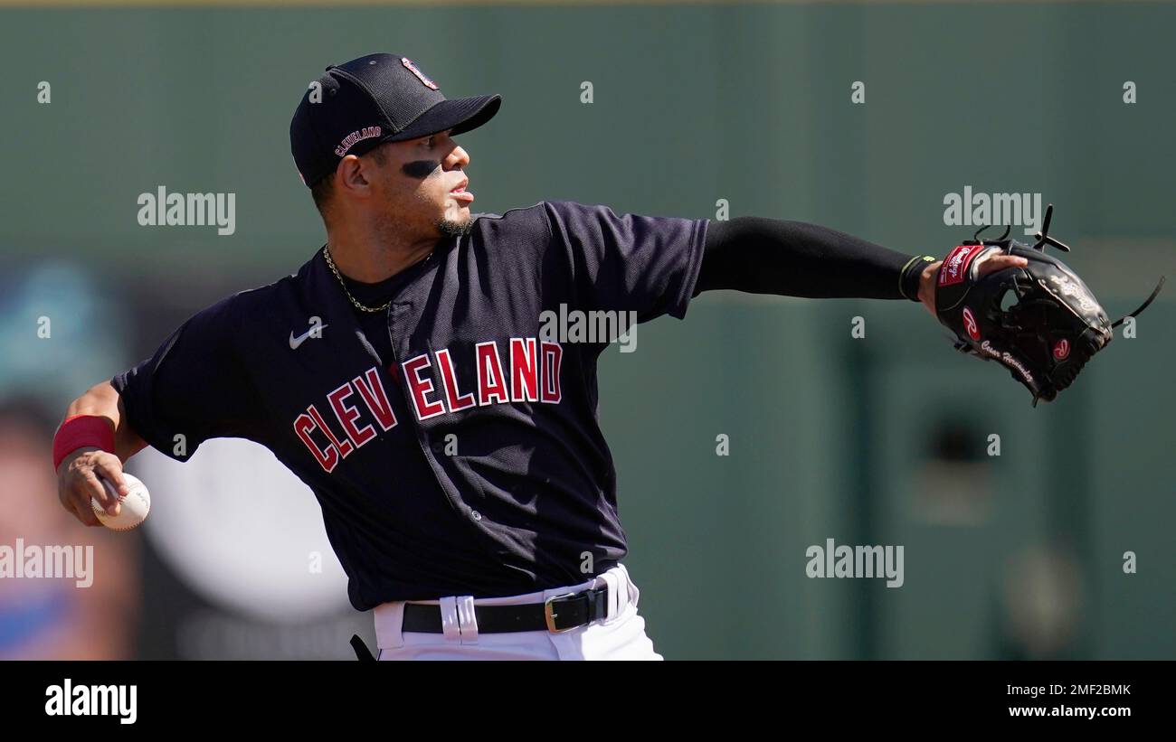 Cleveland Indians second baseman Cesar Hernandez looks to throw to ...