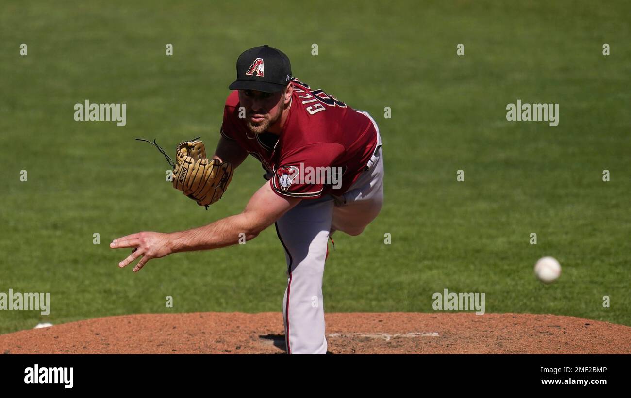 Arizona Diamondbacks pitcher Tyler Gilbert throws a pitch against the ...