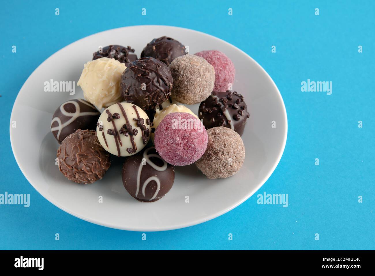 photo of different chocolates lying in a plate Stock Photo - Alamy