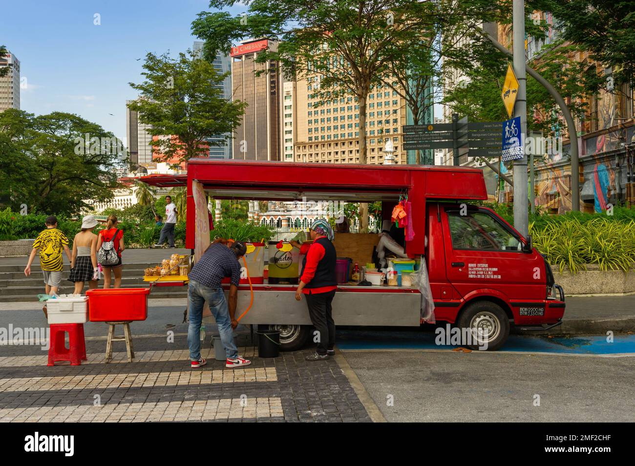 Buying street food at River of Life, Kuala Lumpur, Malaysia Stock Photo ...