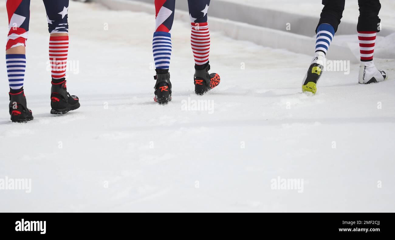 Members of the USA team walk after the WSC Women's Relay 4x5km cross ...