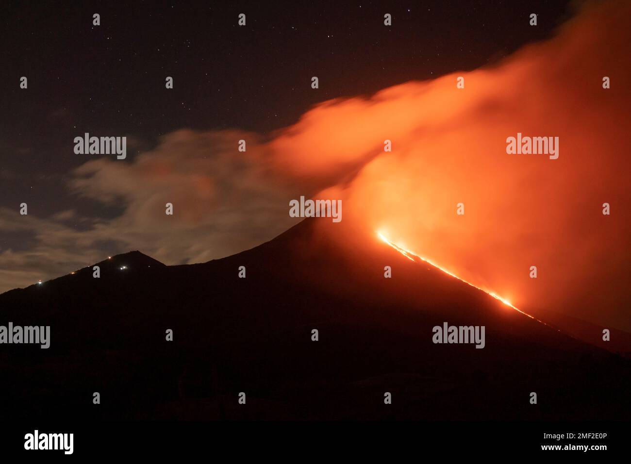 Pacaya volcano spews lava, viewed from San Vicente Pacaya, Guatemala ...