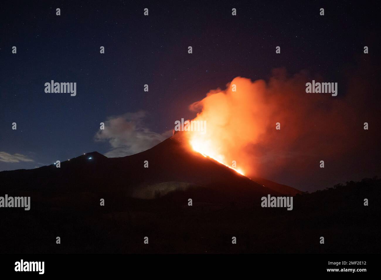 Pacaya volcano spews lava, viewed from San Vicente Pacaya, Guatemala ...