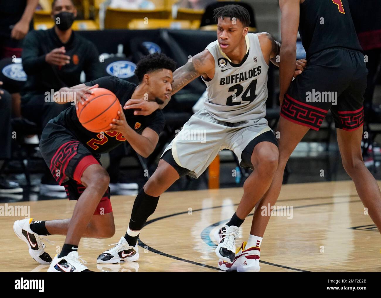 USC guard Tahj Eaddy (2) and Colorado guard Eli Parquet (24) in the ...