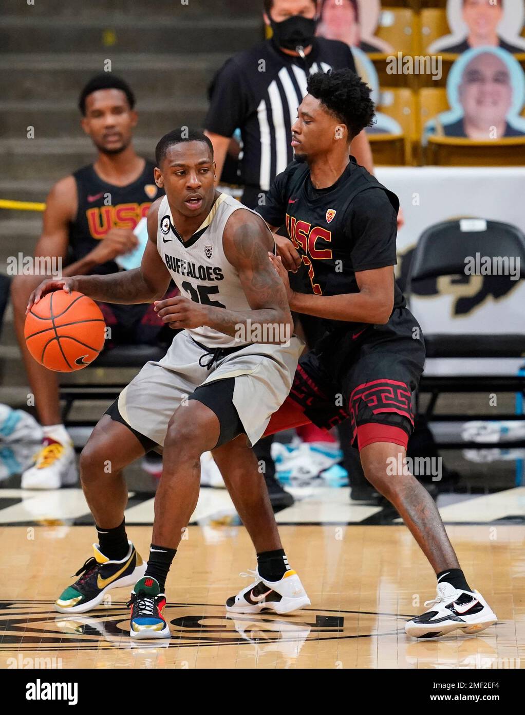 Colorado guard McKinley Wright IV (25) and USC guard Tahj Eaddy (2) in ...