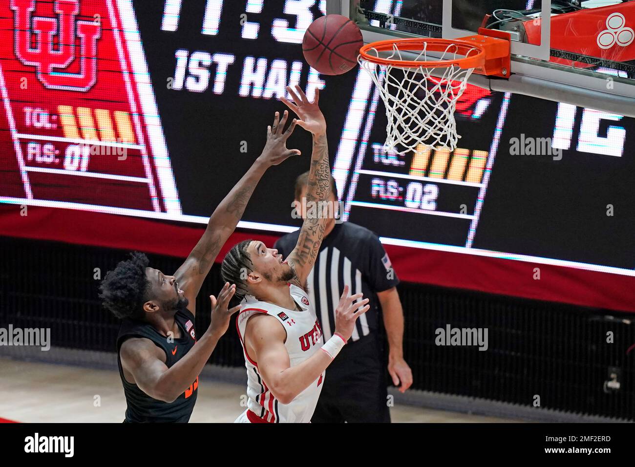 Oregon State guard Tariq Silver, left, defends against Utah forward ...