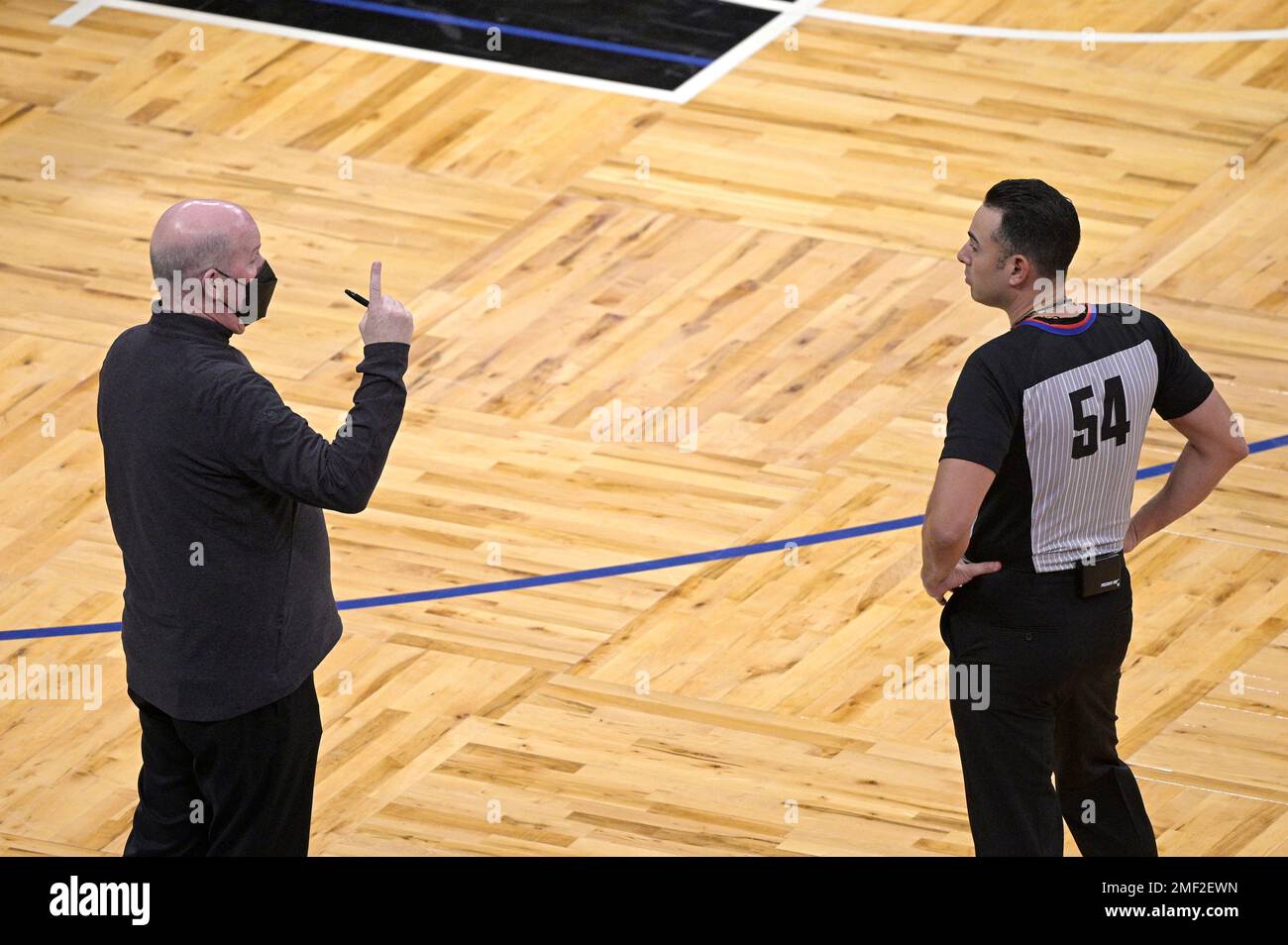 Orlando Magic head coach Steve Clifford, left, argues a call with ...