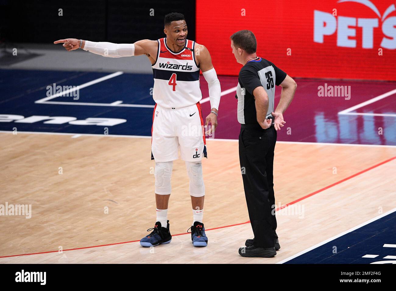 Washington Wizards guard Russell Westbrook (4) gestures next to referee ...