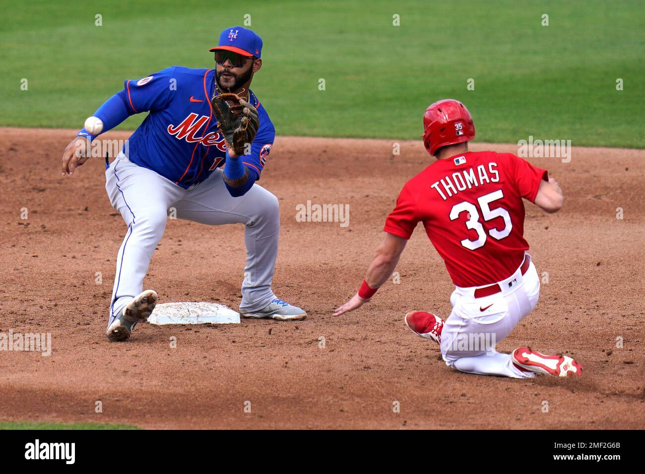 St. Louis Cardinals' Lane Thomas (35) is out attempting to steal second ...