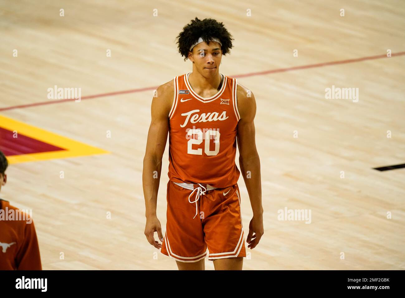 Texas forward Jericho Sims walks off the court after an NCAA college ...