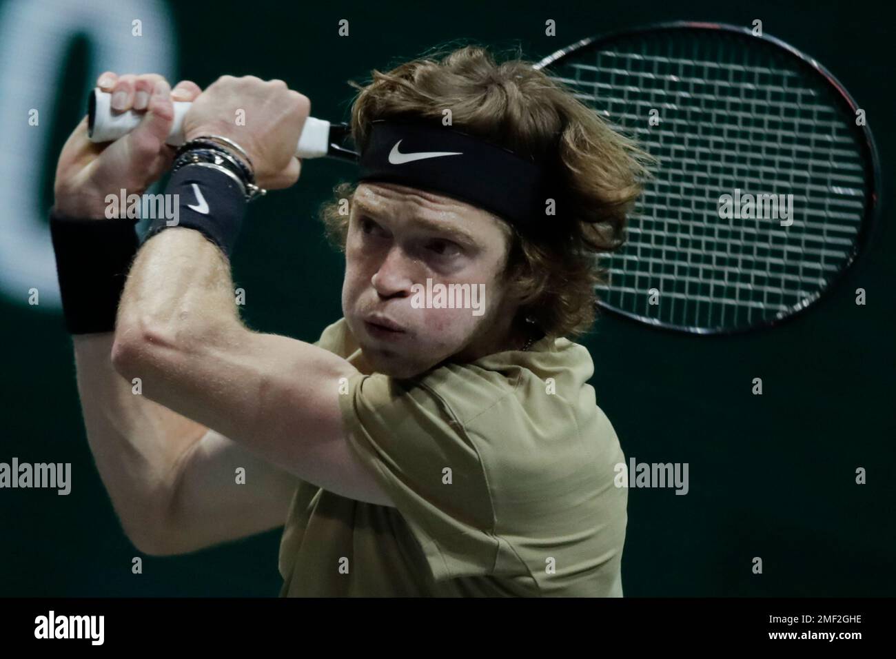 Russia's Andrey Rublev plays a shot against Britain's Andy Murray in ...