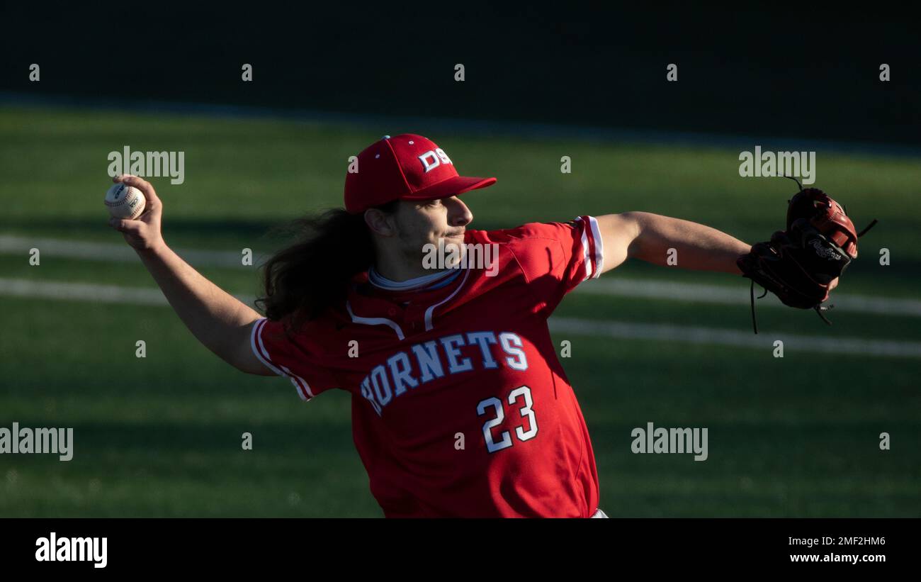 Delaware State pitcher Cole Bates throws against LaSalle during an NCAA ...