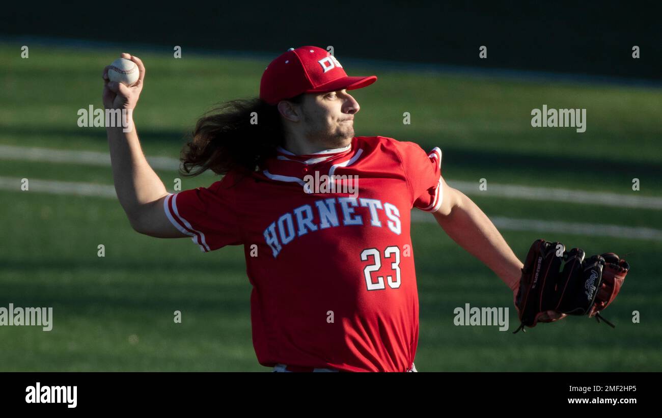 Delaware State pitcher Cole Bates throws against LaSalle during an NCAA ...