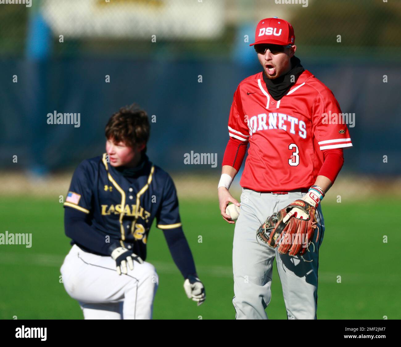Delaware State second baseman John Weglarz reacts after tagging a ...