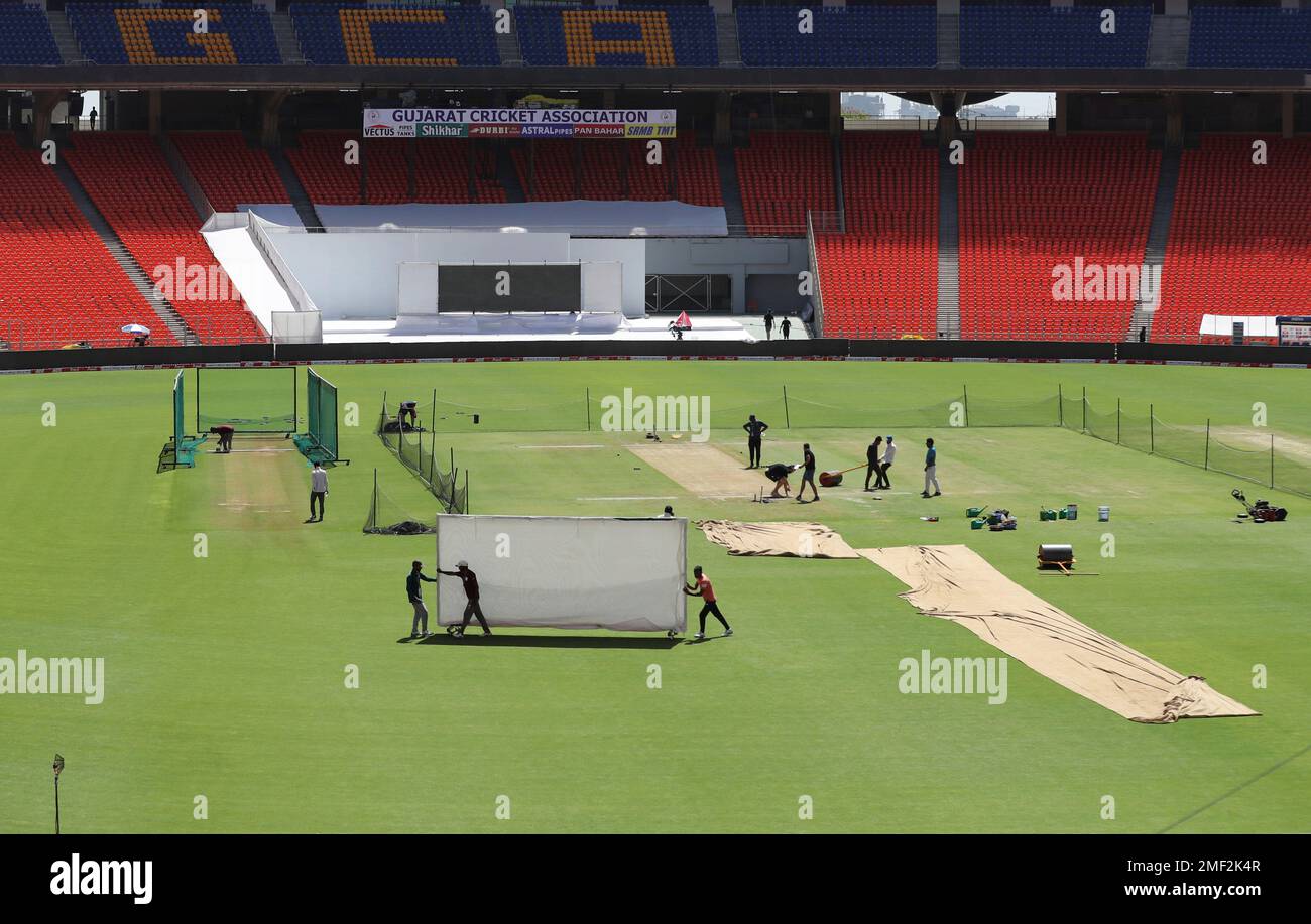 Groundsmen work around pitch area ahead of the fourth test cricket ...