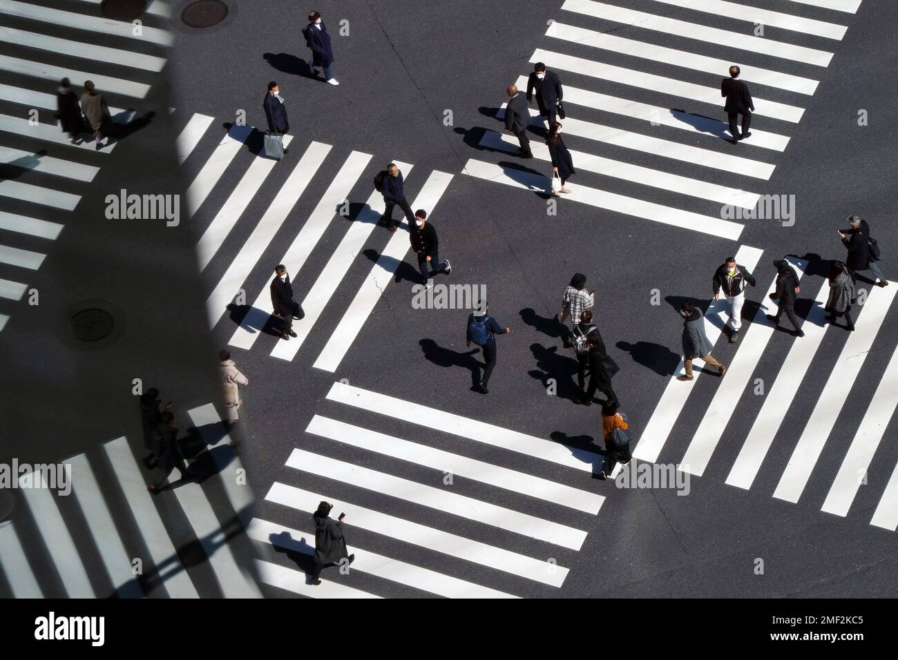 People wearing protective masks to help curb the spread of the ...
