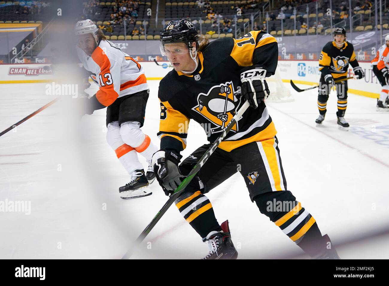 Pittsburgh Penguins' Sam Lafferty (18) plays against the Philadelphia ...
