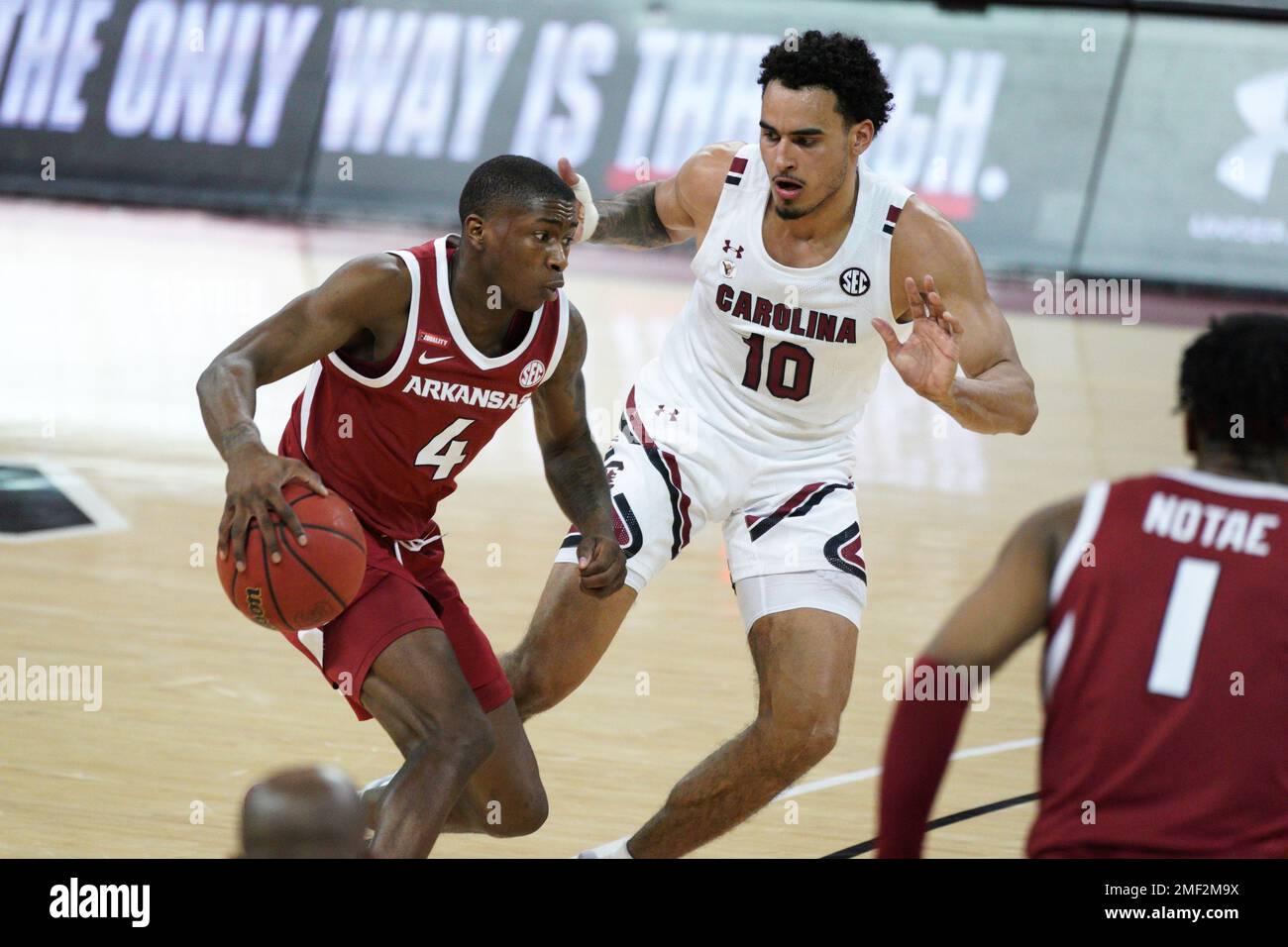 Arkansas guard Davonte Davis (4) drives against South Carolina forward ...