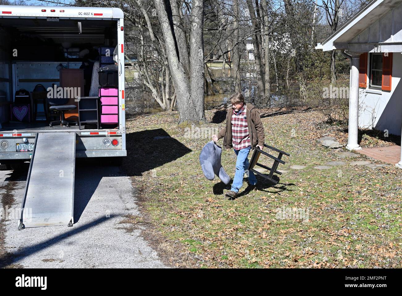 Ray Smith helps to move the furniture from the home of his friend Kelly ...