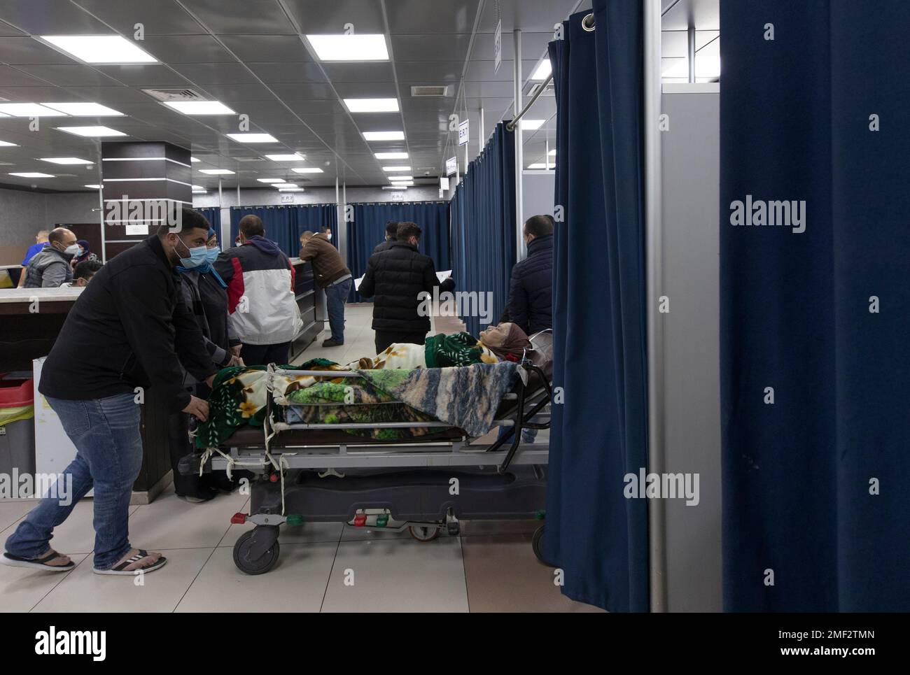 A Palestinian patient infected with COVID-19 is admitted for medical ...