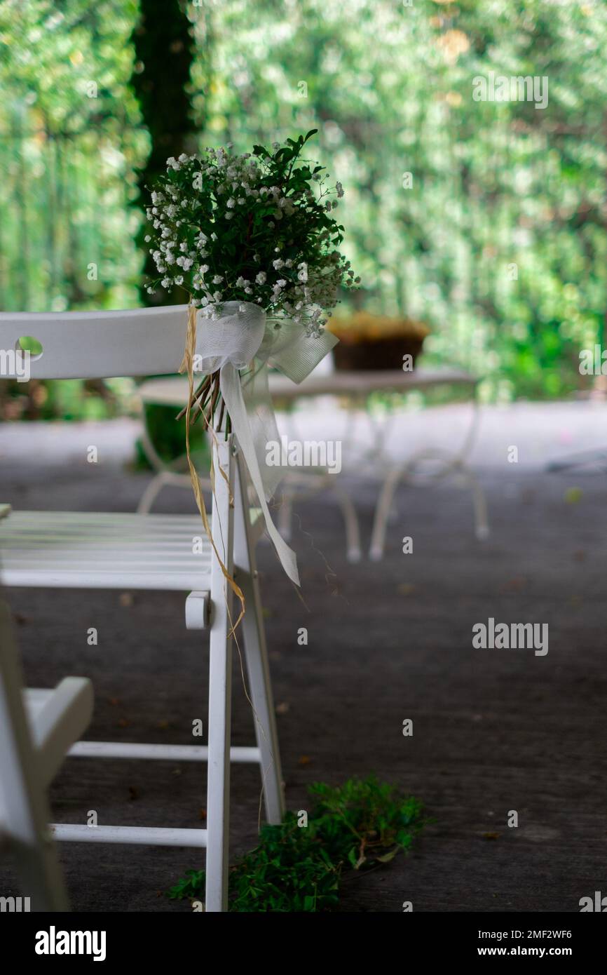 Wedding decoration. White stools for bride and groom Stock Photo - Alamy