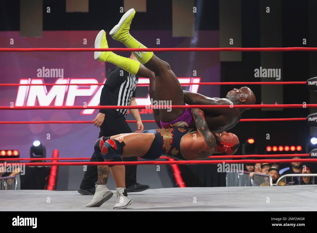 IMPACT World Champion Josh Alexander (bottom) flips Moose (top) at the ...