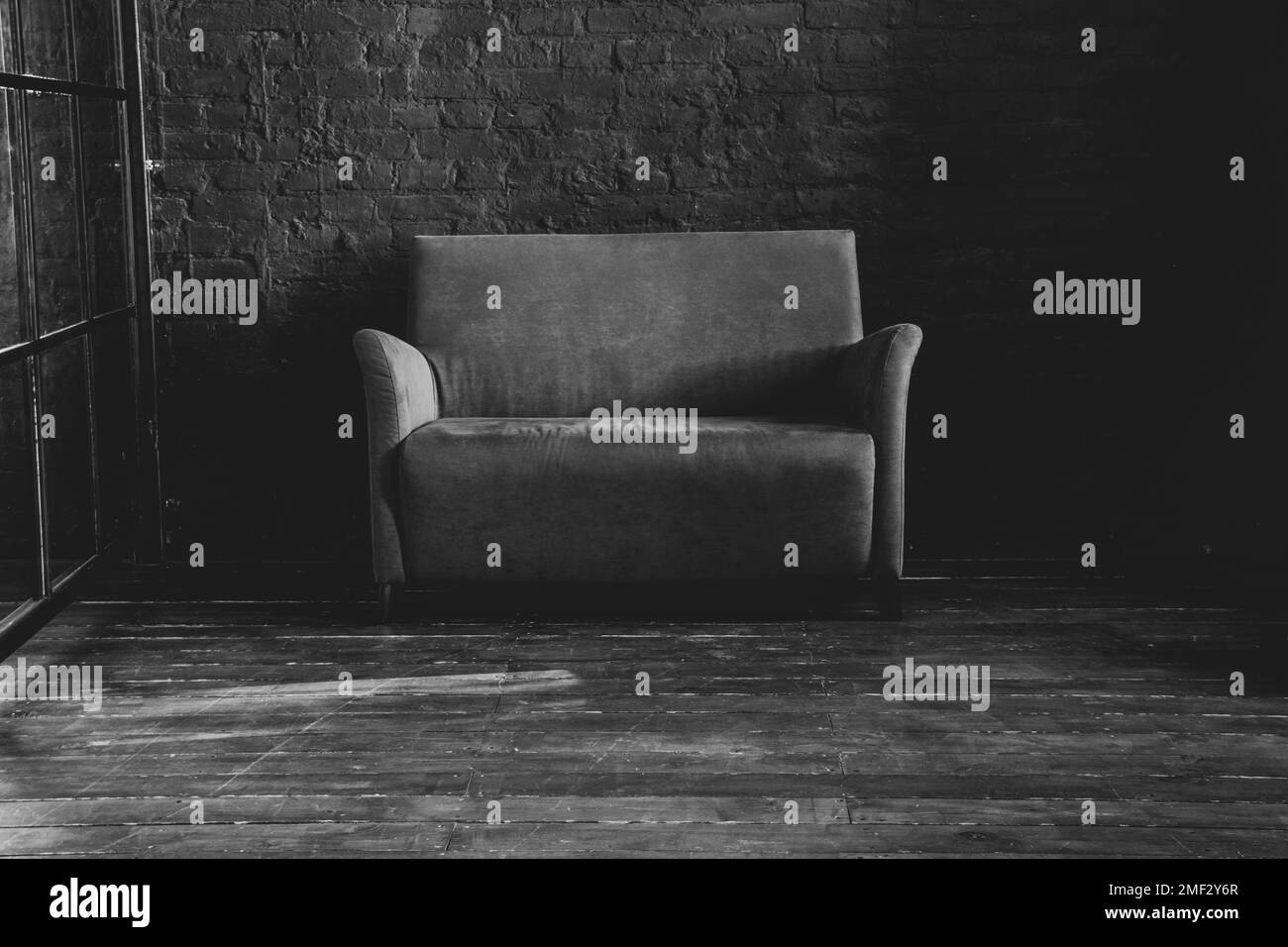 Sofa in room green Black and White Stock Photos & Images - Alamy