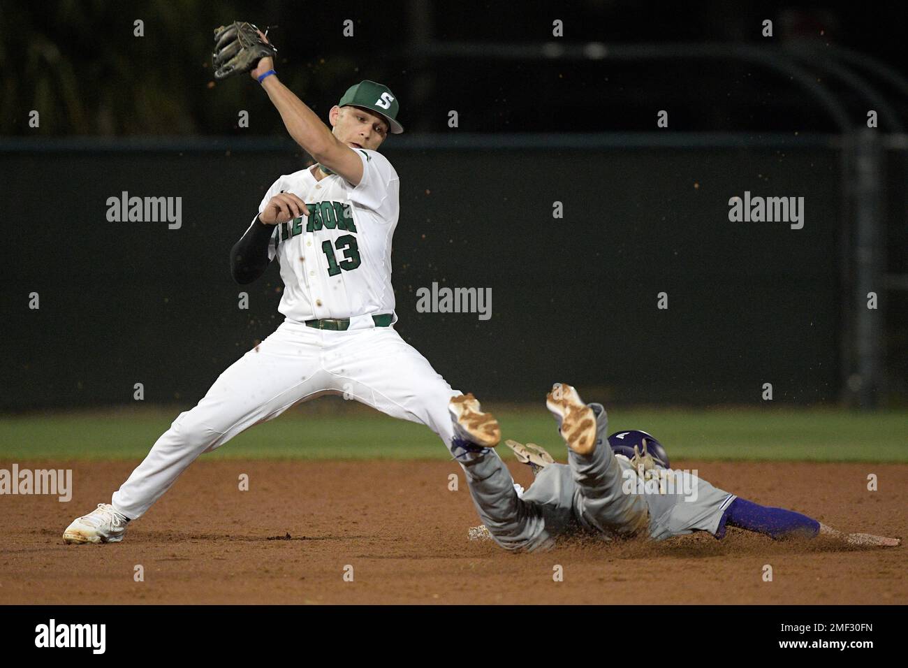 North Alabama's Reid Homan (7) safely steals second base ahead of the ...