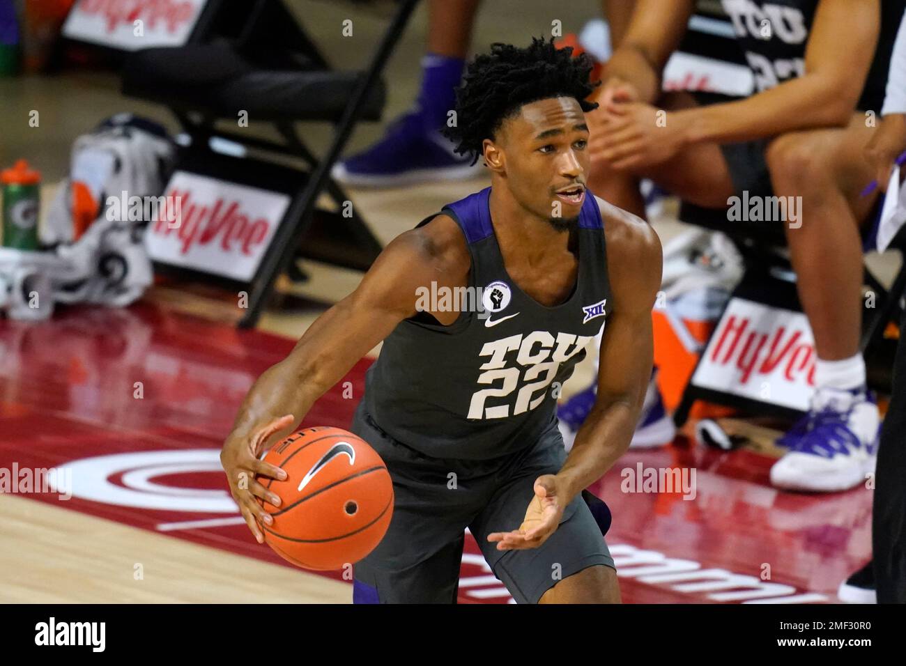 TCU guard RJ Nembhard drives up court during the first half of an NCAA ...