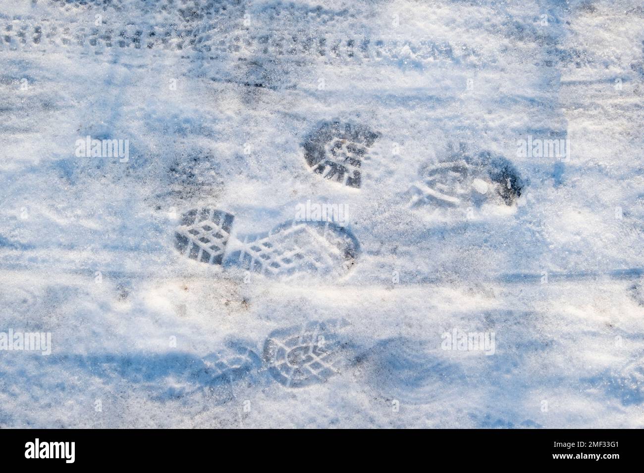Winter scenic. Trace of boot in the snow Stock Photo - Alamy