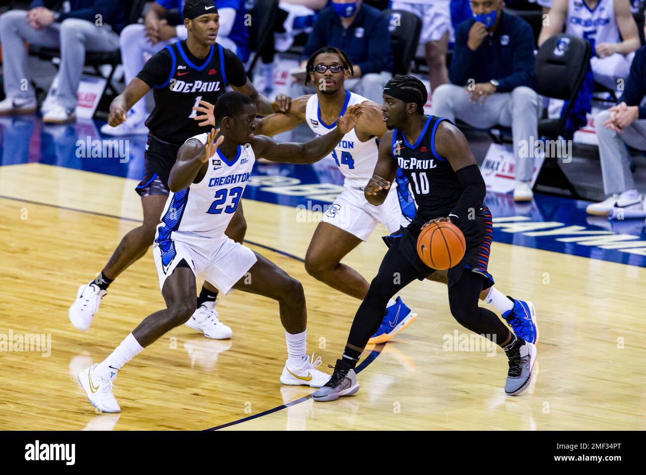 DePaul guard Ray Salnave (10) dribbles the ball against Creighton ...