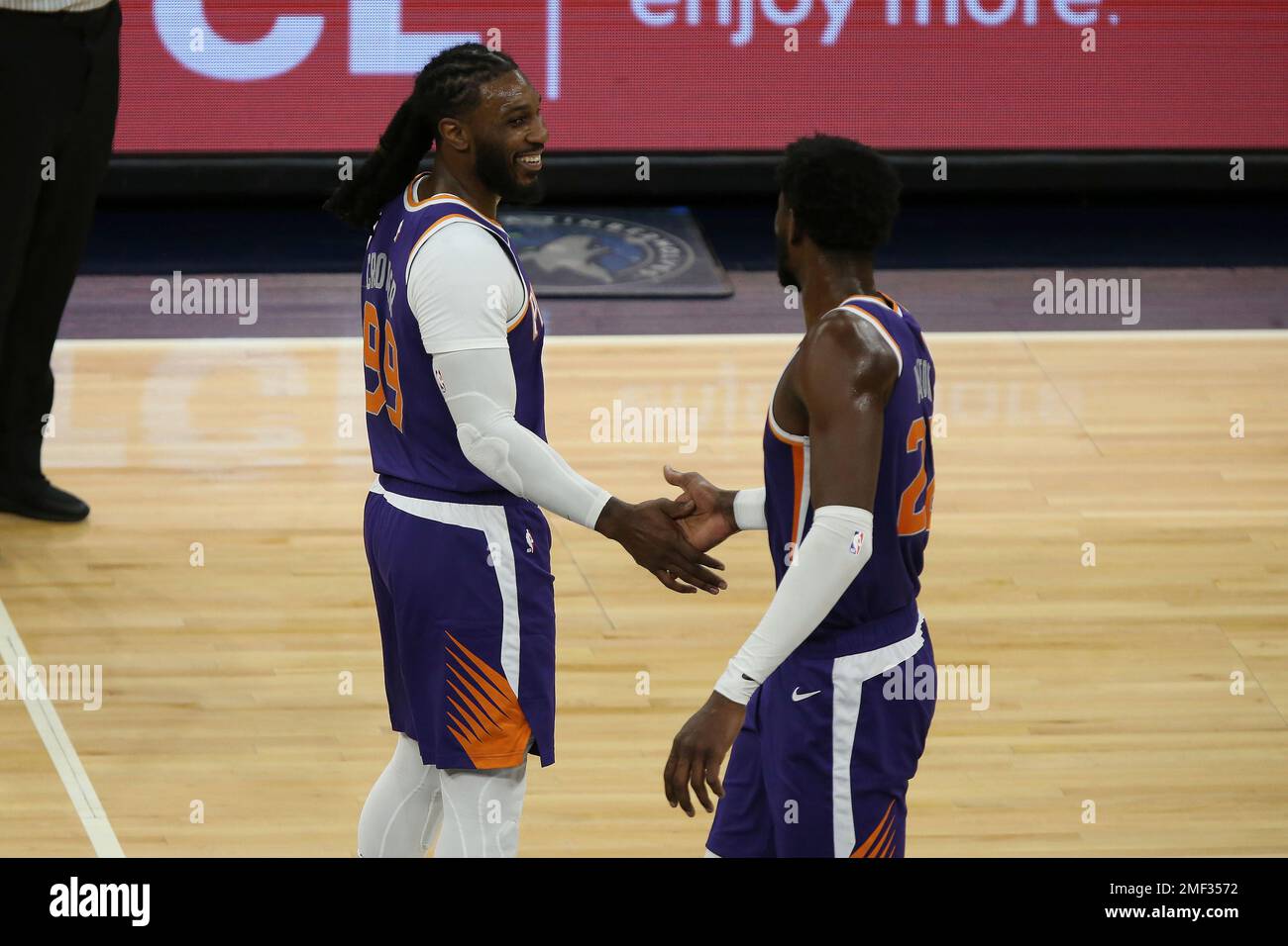Phoenix Suns' Jae Crowder (99) smiles at teammate Phoenix Suns' Deandre ...