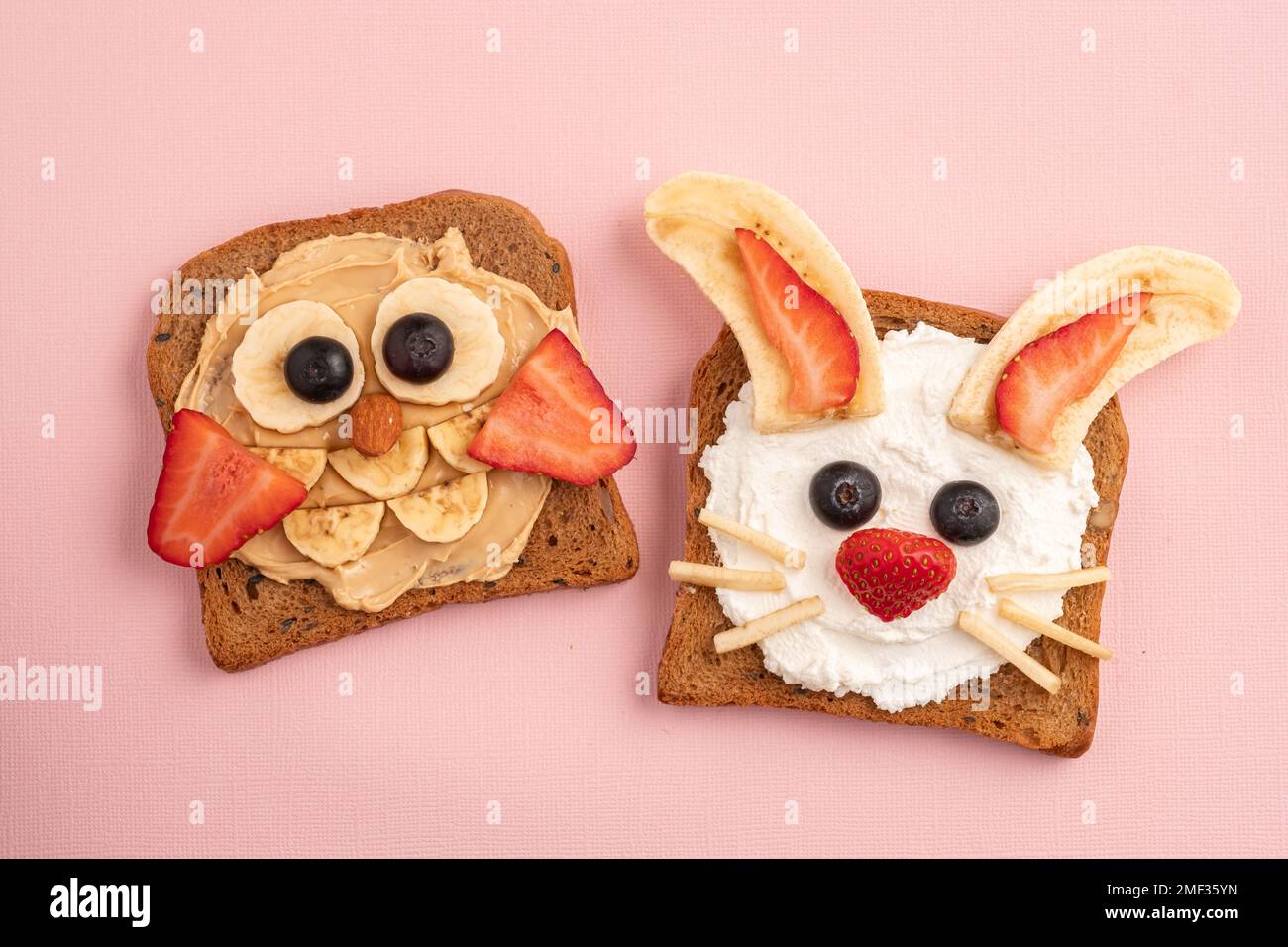 Funny animal faces toasts for kids lunch Stock Photo - Alamy