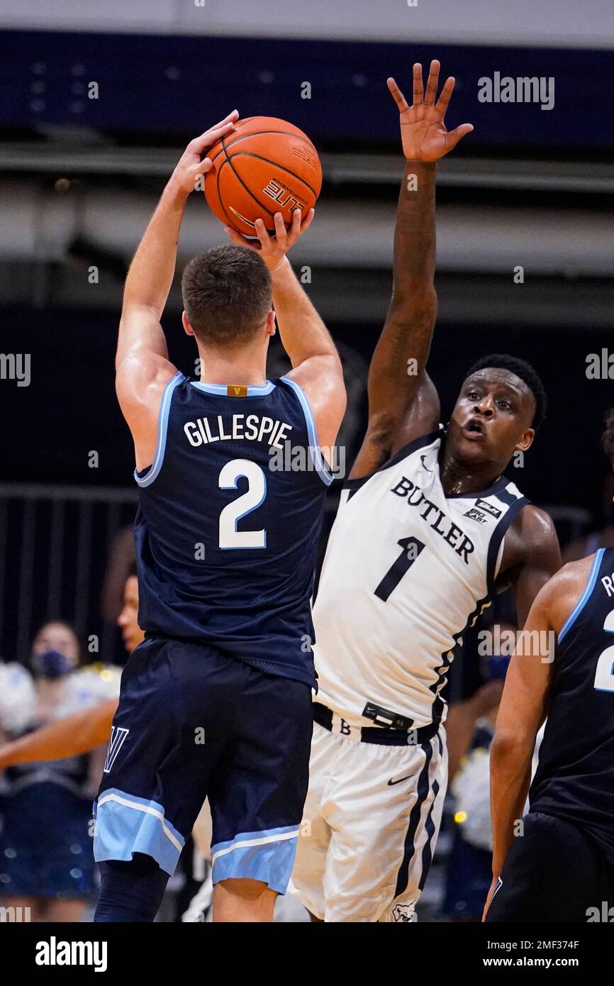 Villanova guard Collin Gillespie (2) shoots over Butler guard Bo Hodges ...
