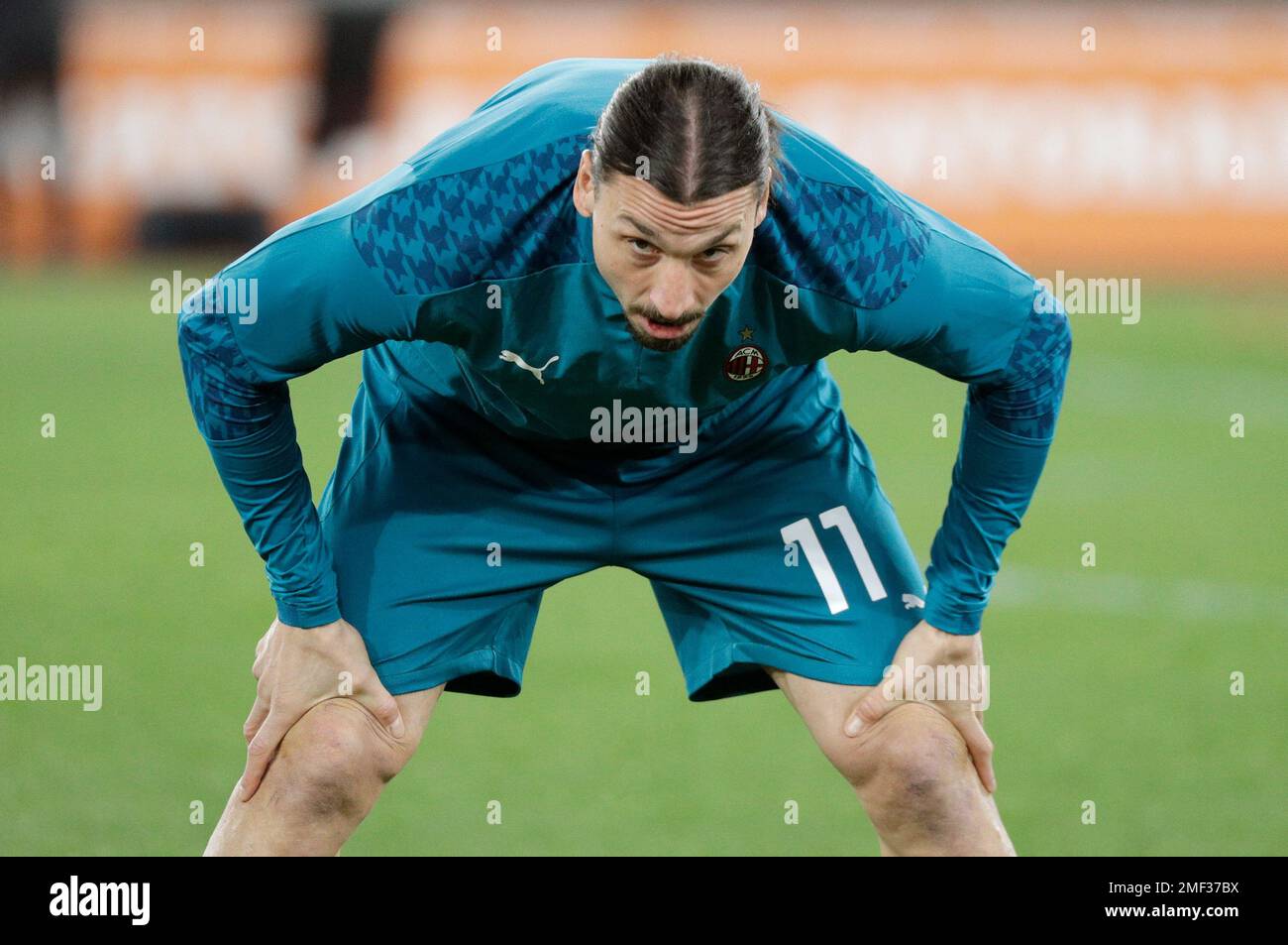 AC Milan's Zlatan Ibrahimovic takes Martin the warm up ahead of the ...