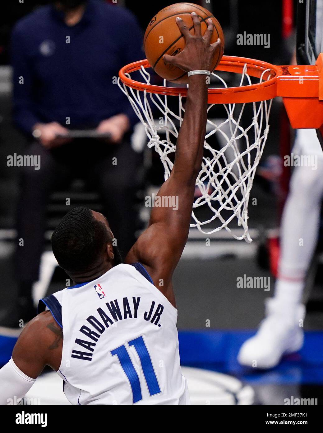 Dallas Mavericks forward Tim Hardaway Jr. (11) dunks in the first half ...