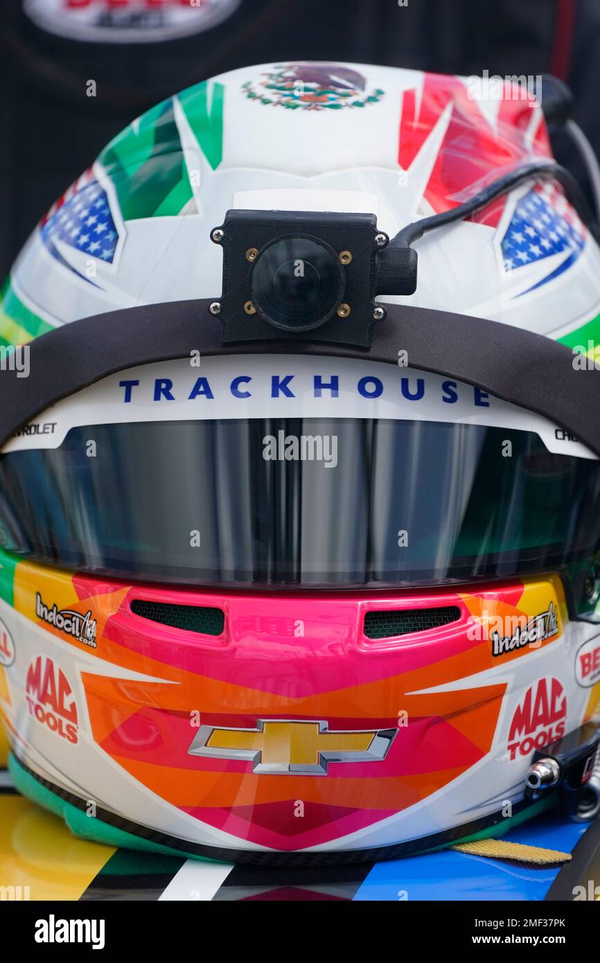The helmet belonging to Daniel Suarez (99) is shown before the start of ...