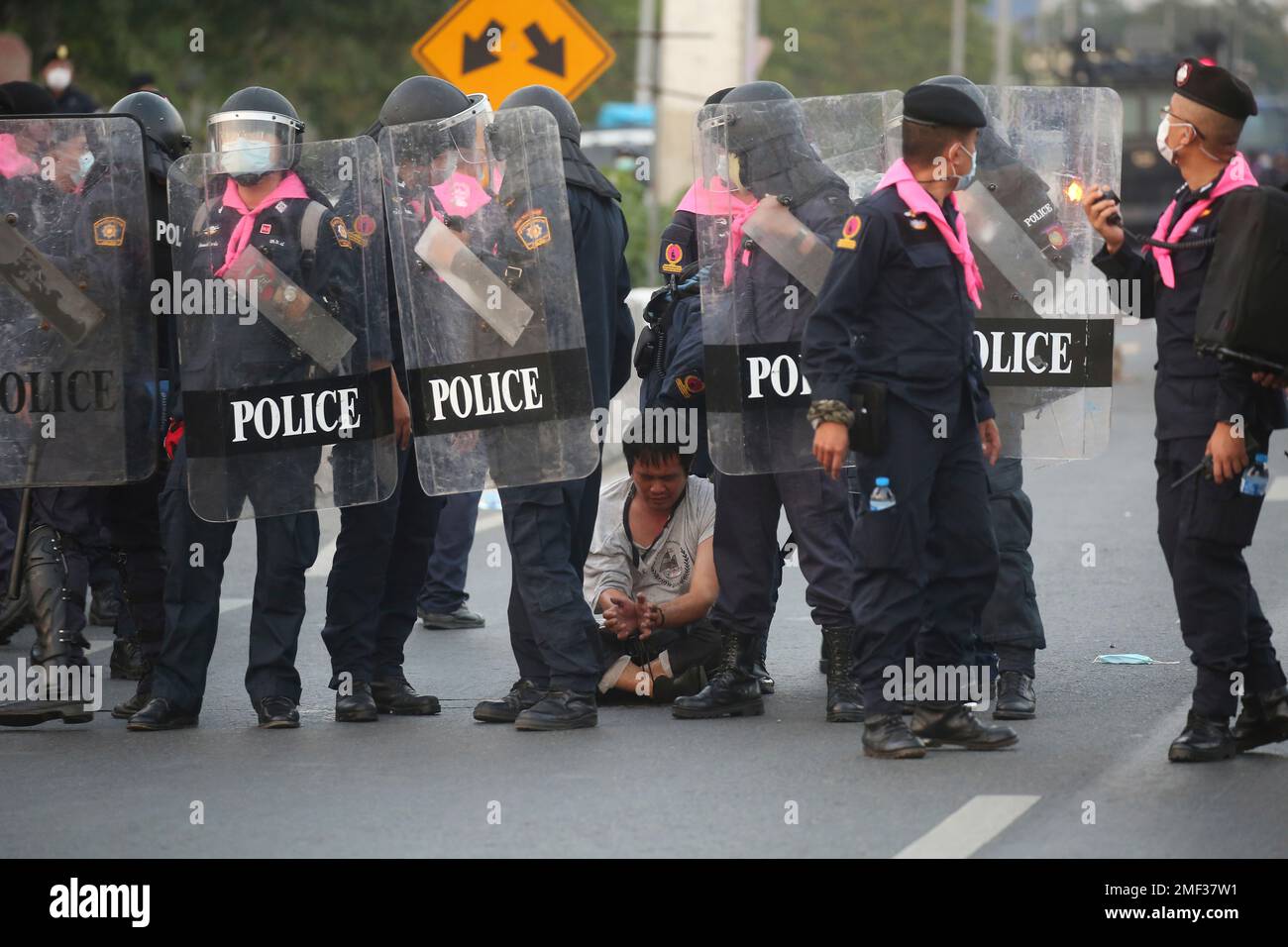 Riot policemen arrest an anti-government protester, during a protest in ...