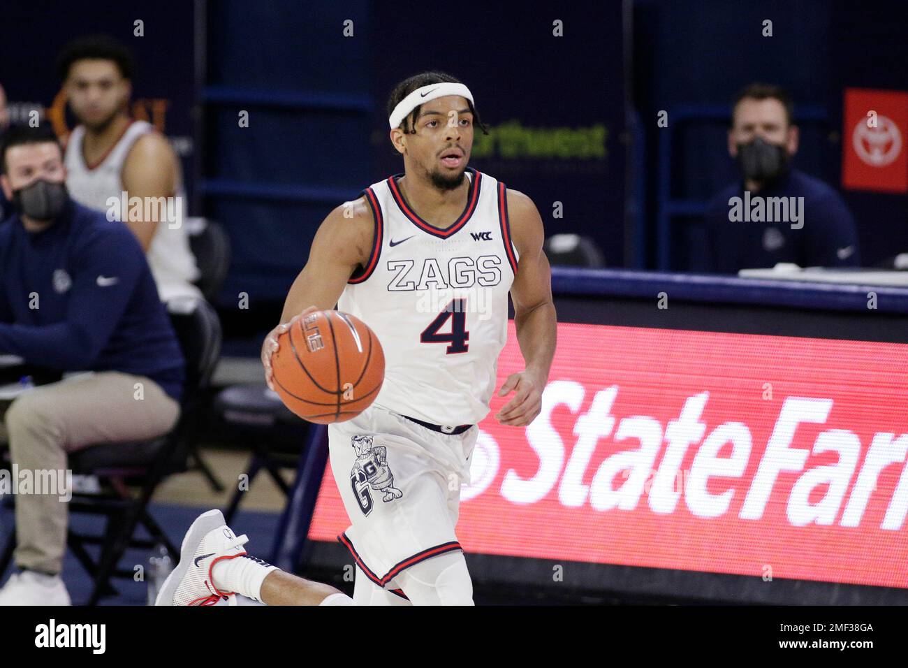 Gonzaga guard Aaron Cook brings the ball up the court during the first ...