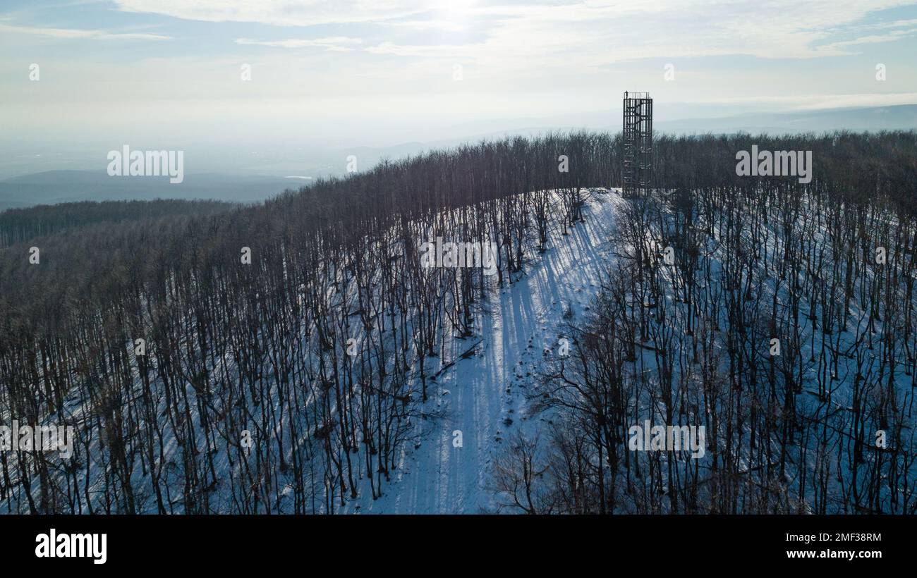 Aerial view of wooden lookout tower on the top of Velka Homola in ...