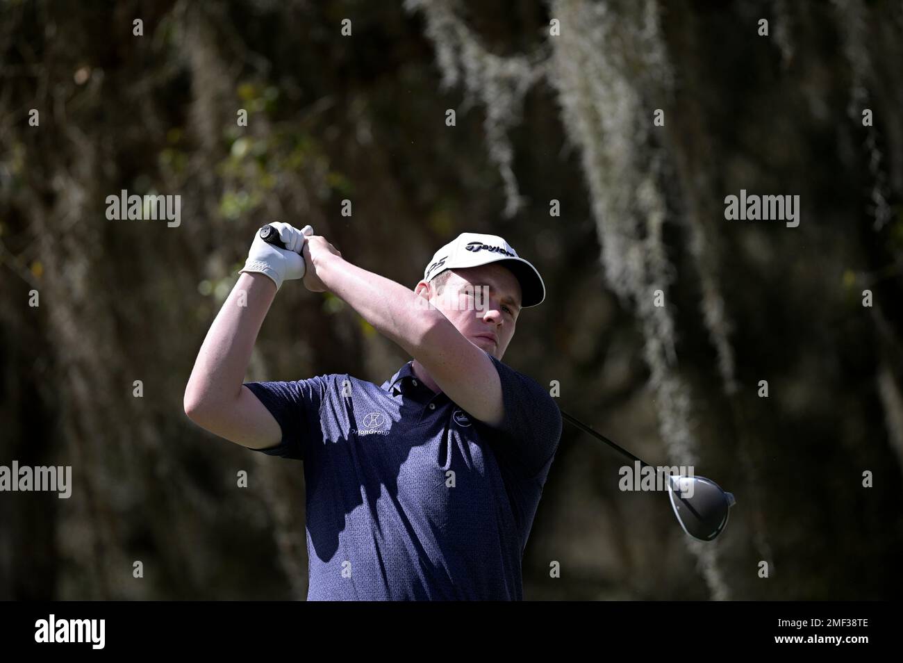 Robert MacIntyre, of Scotland, watches his tee shot on the ninth hole ...