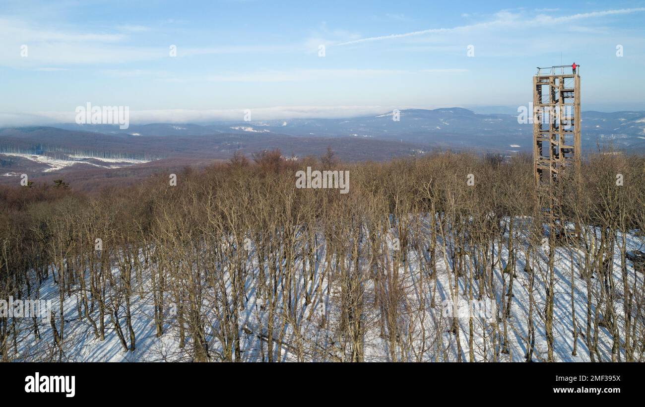 Aerial view of wooden lookout tower on the top of Velka Homola in ...
