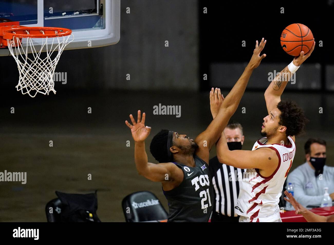 Iowa State forward George Conditt IV shoots over TCU center Kevin ...