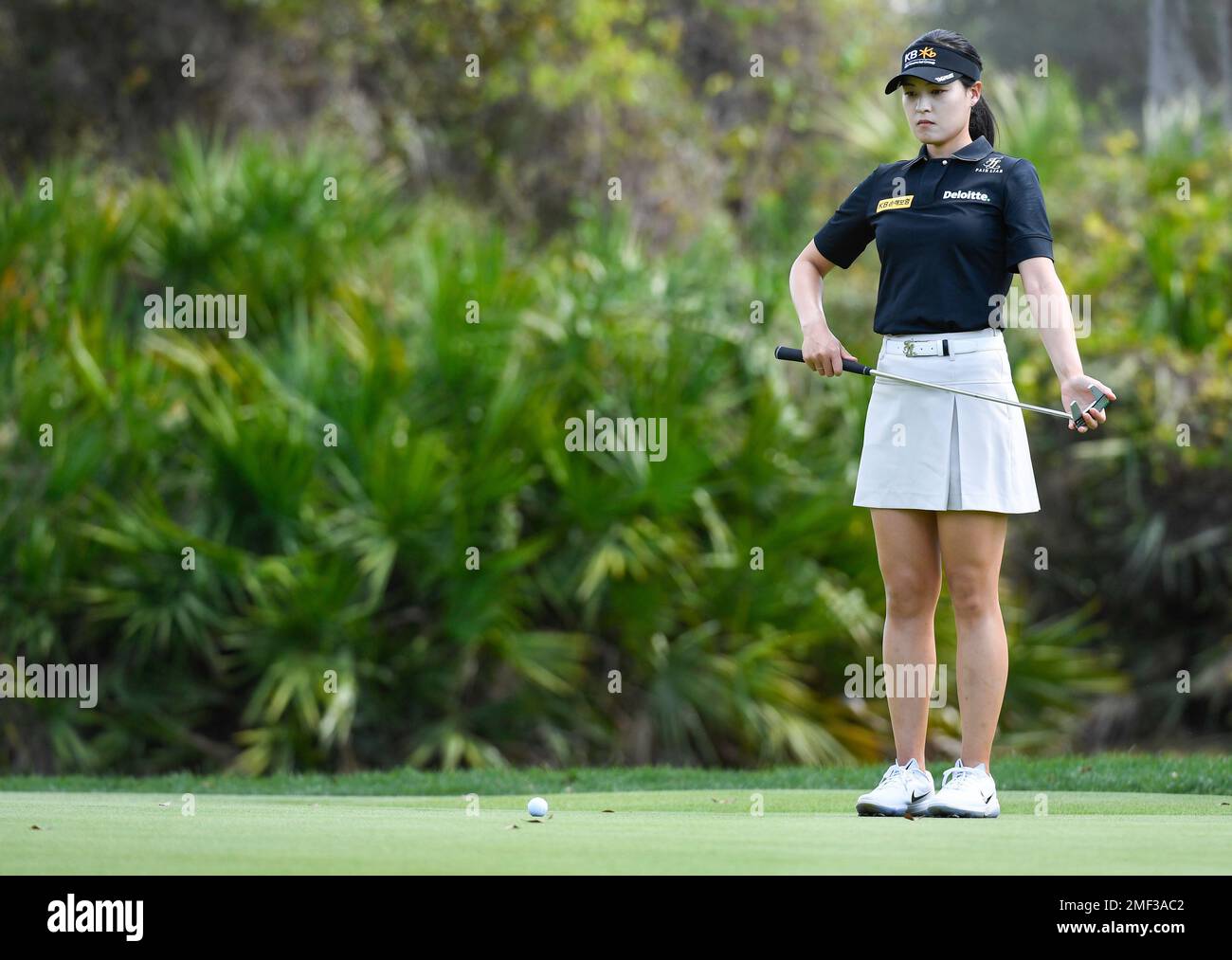 In Gee Chun, of South Korea, approaches her ball on the eighth green ...